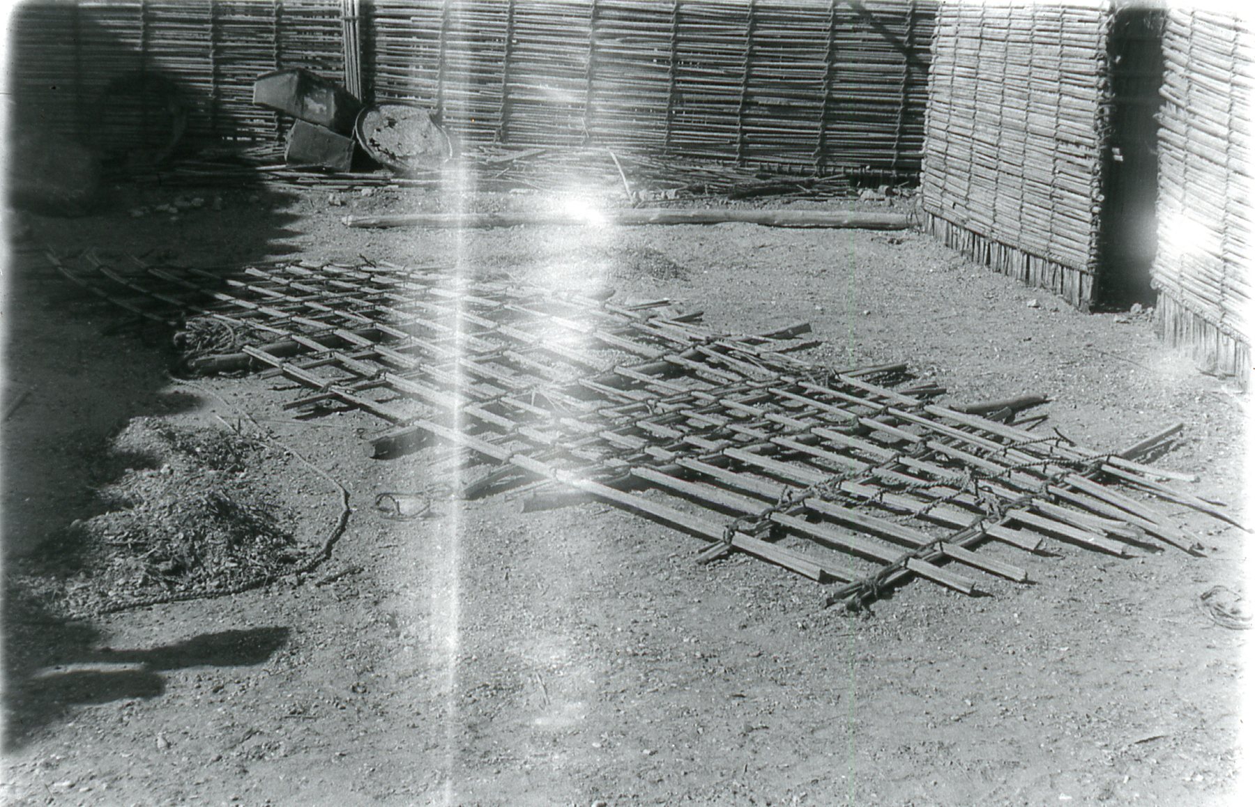 Roof of traditional house laid out for weaving | DW Digital Archive